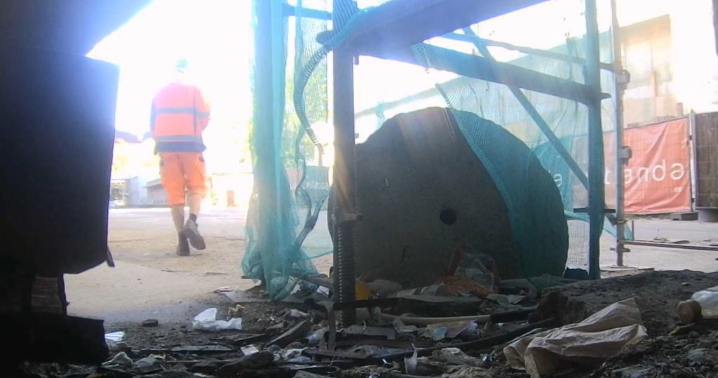 Workers at the construction site and dumping field - The Tree Spy